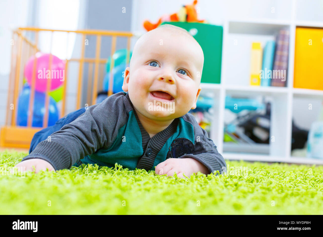 Baby boy crawling Stock Photo - Alamy
