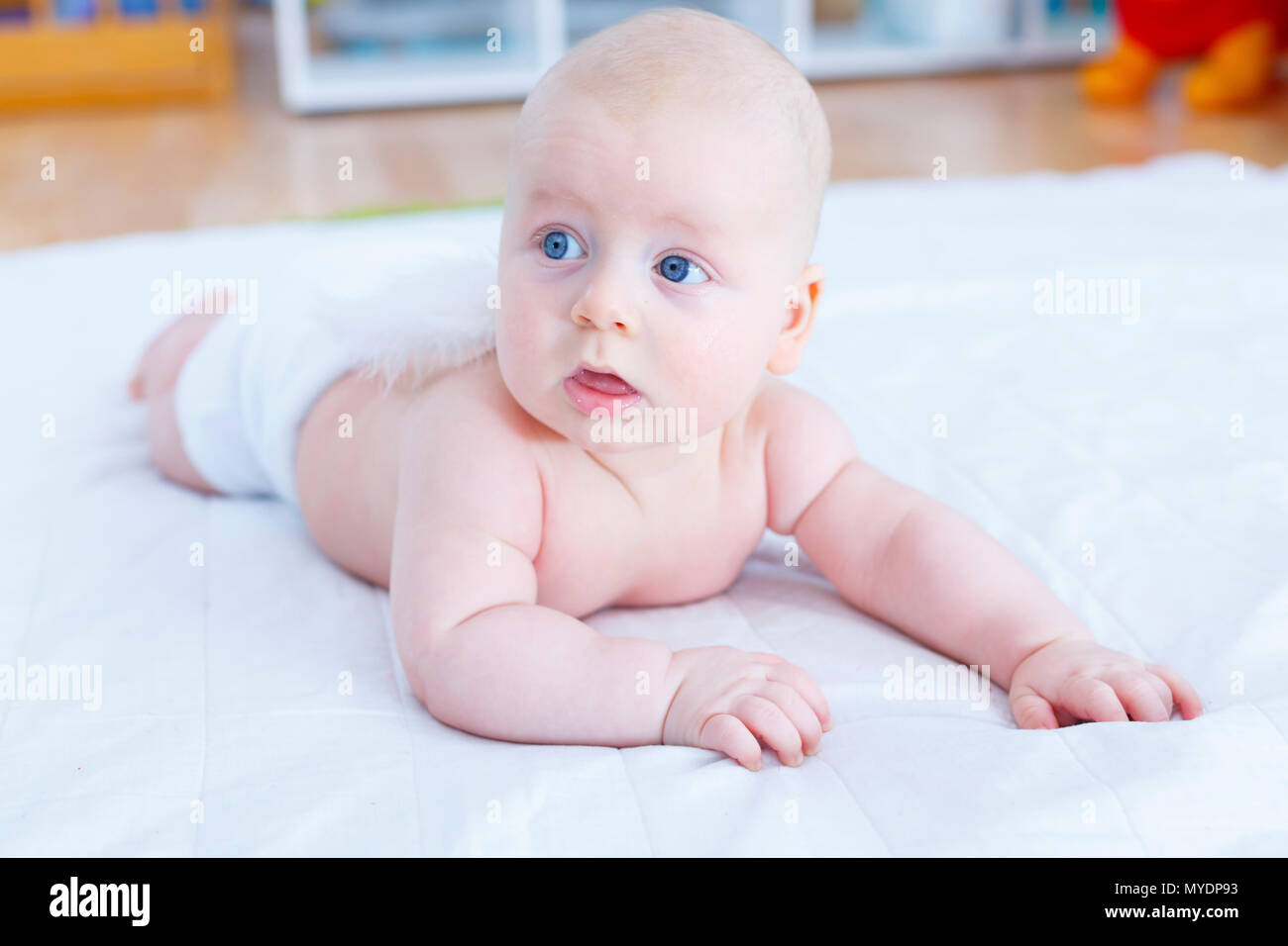 Baby boy crawling Stock Photo - Alamy