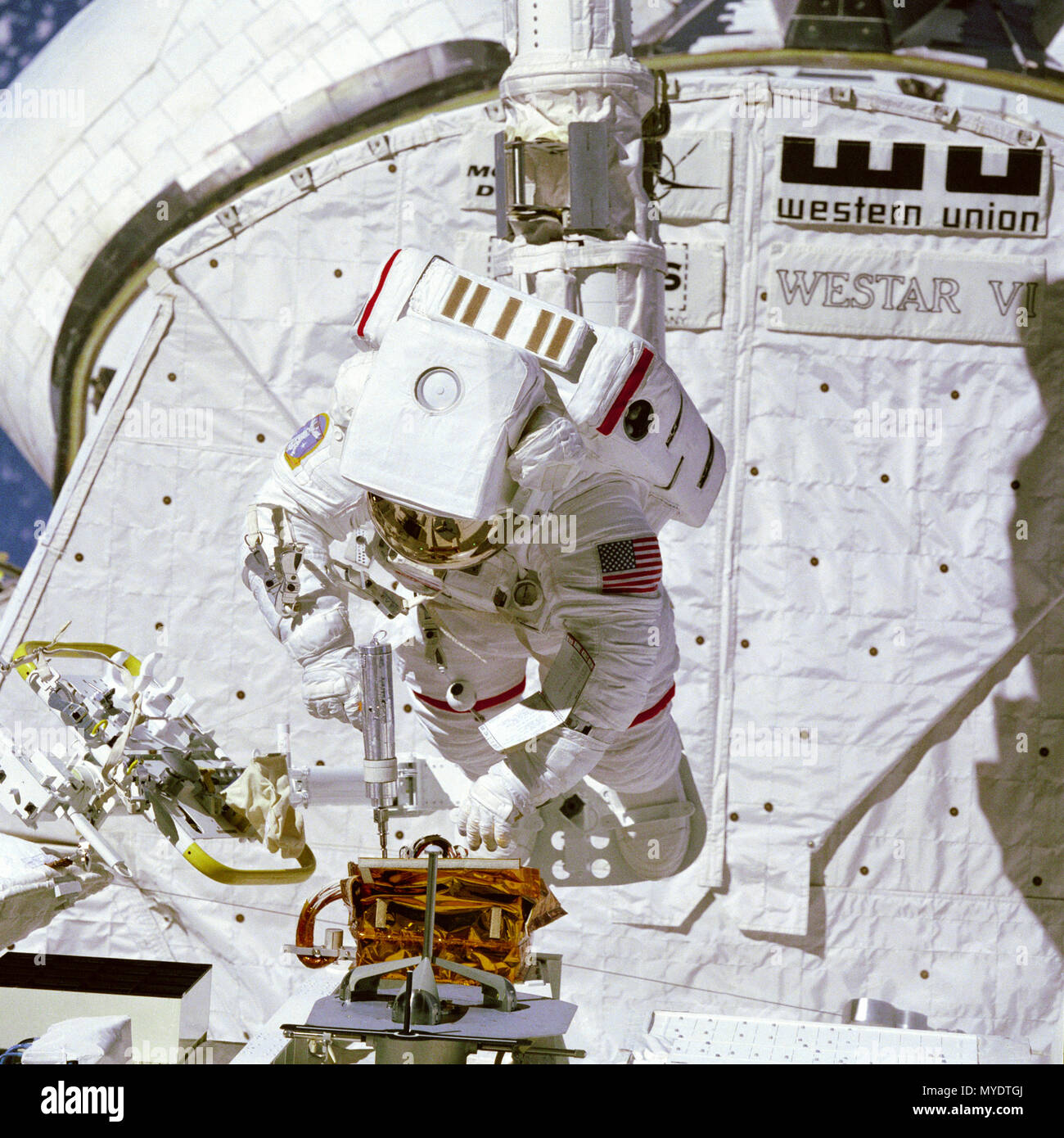 Astraunauts Nasa Using Tools