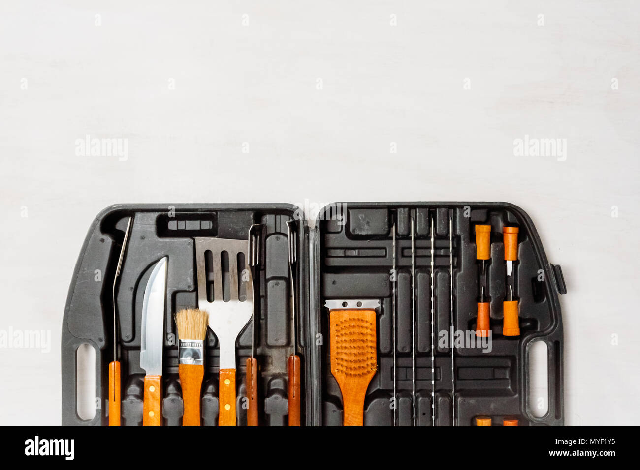 Simple BBQ cooking set in plastic case Stock Photo - Alamy