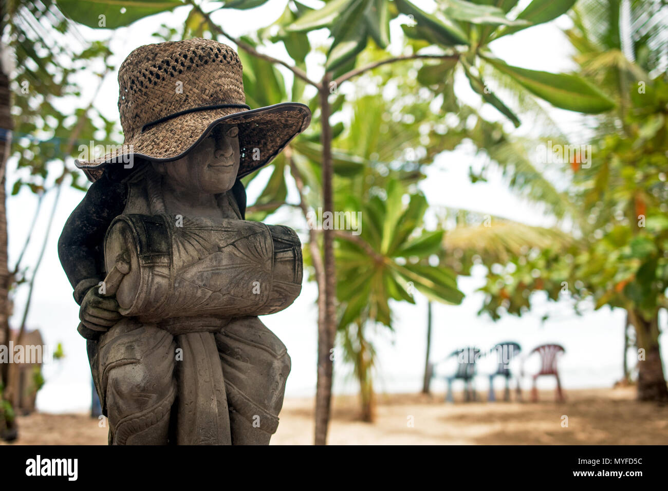 exotic smile statue in bali beach Stock Photo - Alamy