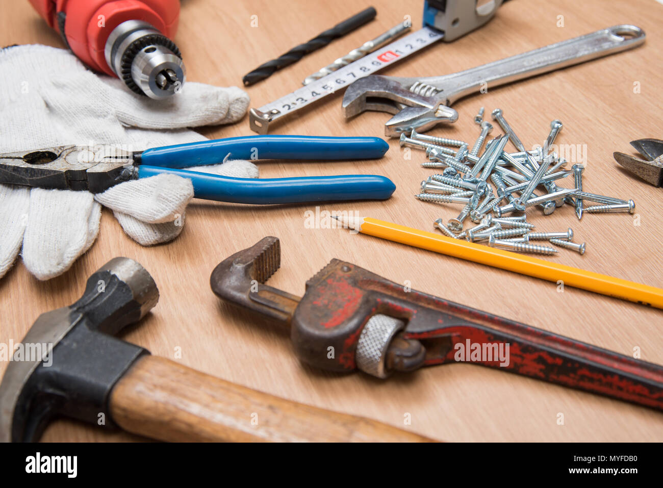 Construction Tools On Wooden Desk Stock Photo - Alamy