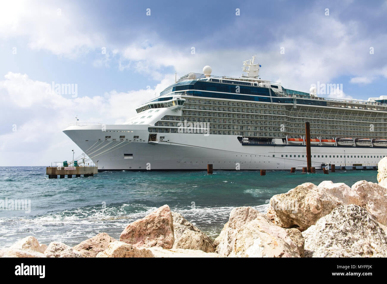 Cruise Ship Beyond Rocks Stock Photo - Alamy