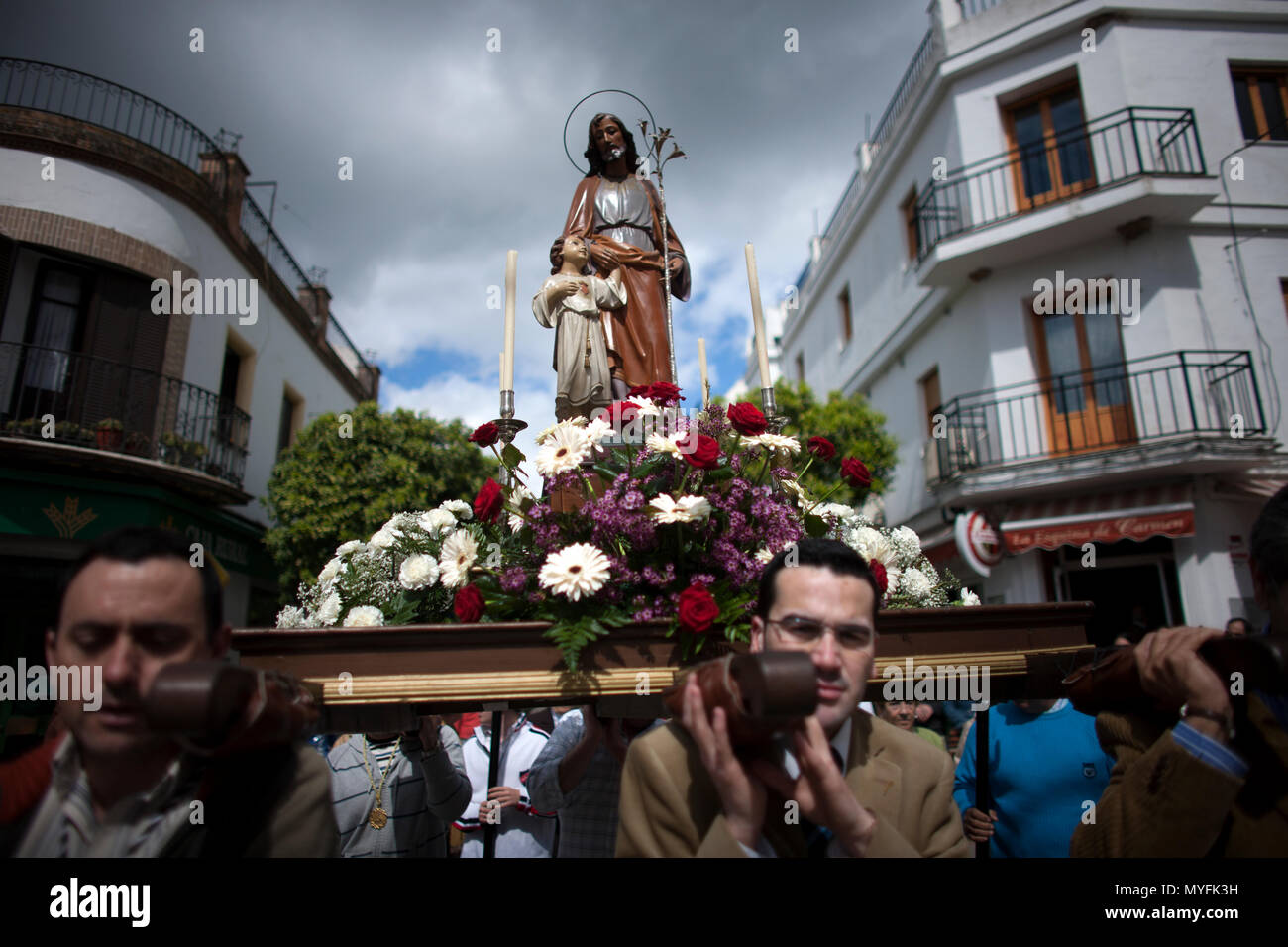 A sculpture of San Jose (Joseph) is carried during a religious ...