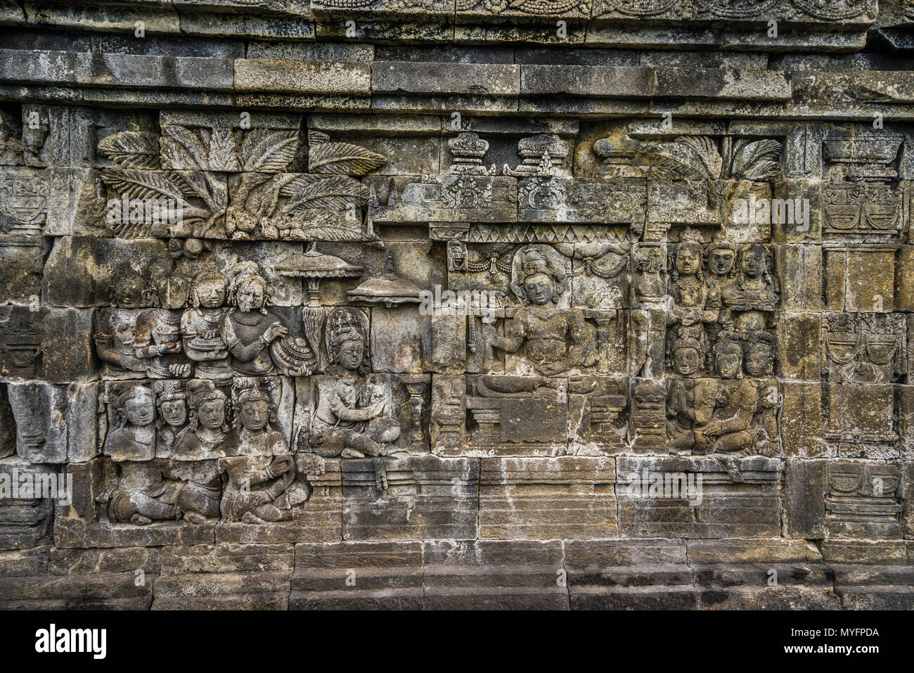 bas relief panel on a balustrade of 9th century Borobudur Buddhist ...