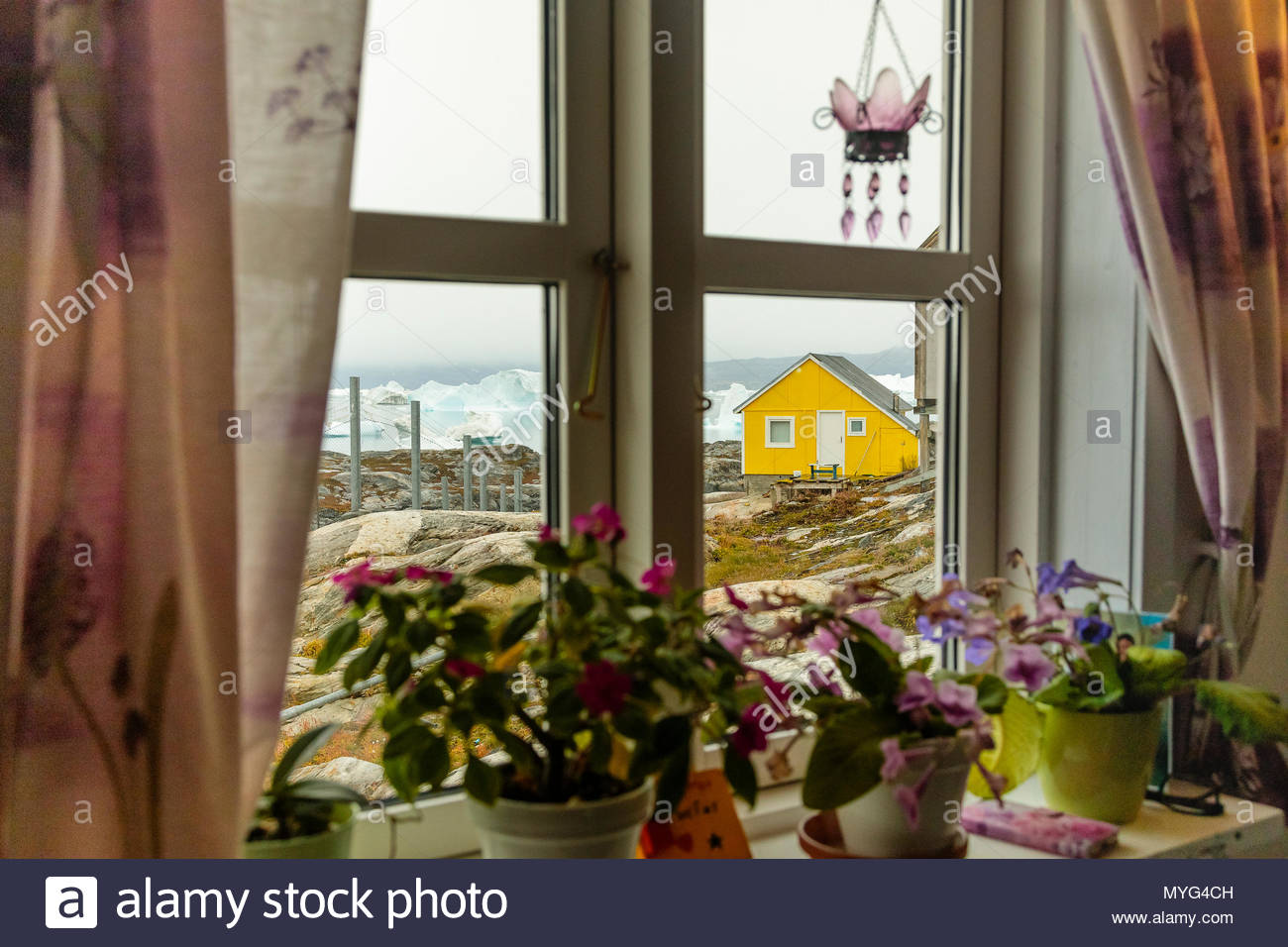 View from inside a house in the Inuit village of Tiniteqikaq Stock ...