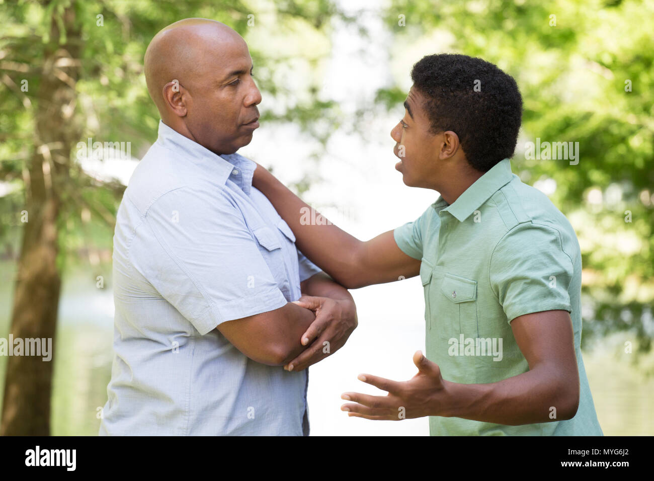 Father and son having a heated discussion Stock Photo - Alamy