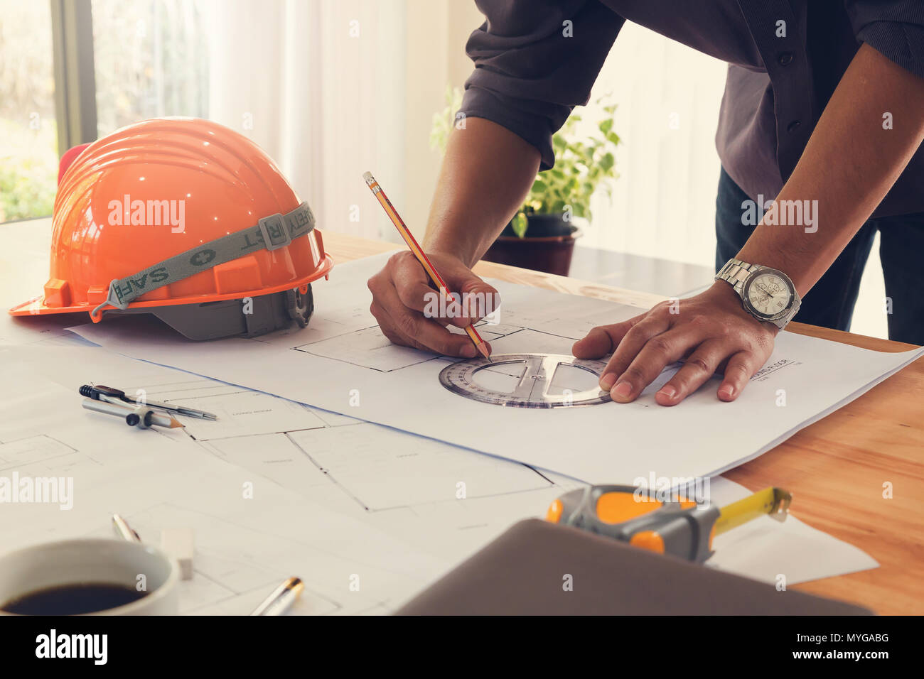 Architect concept, Architects office working with blueprints Stock ...