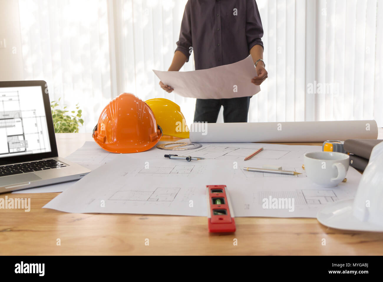 Architect concept, Architects office working with blueprints Stock ...