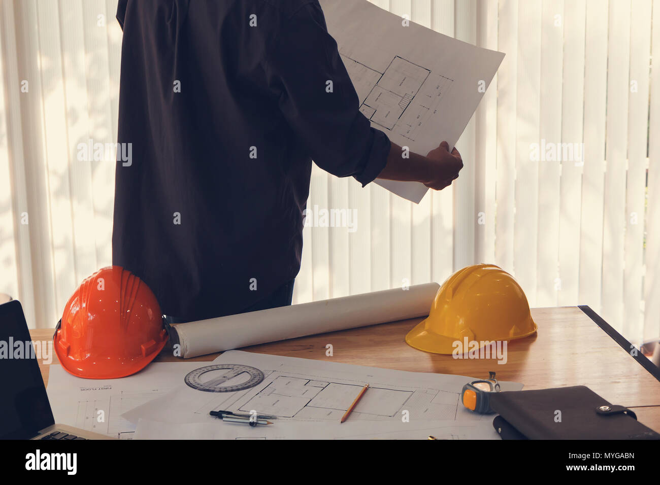 Architect concept, Architects office working with blueprints Stock ...