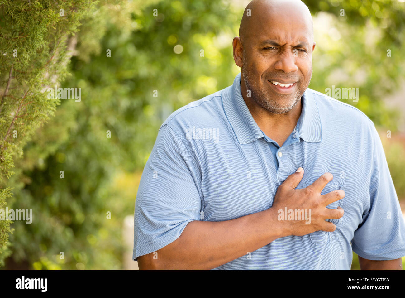 African American man having a heart attack Stock Photo - Alamy