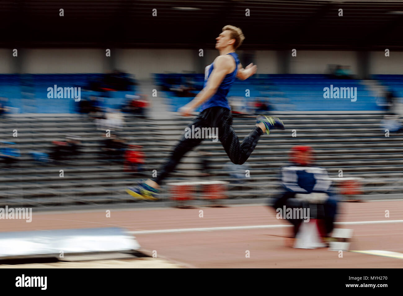 long jump male jumper athlete blurred motion during UrFO Championship ...