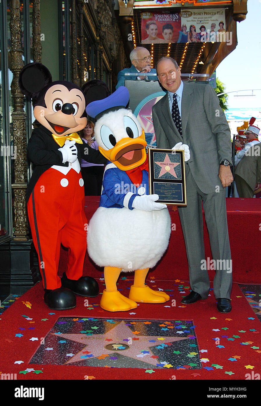 Donald Duck, posing with Michael Eisner and Mickey Mouse received the ...