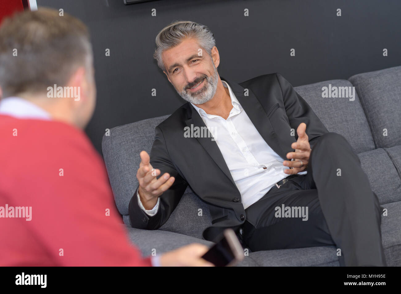 Wearing formal attire hi-res stock photography and images - Alamy