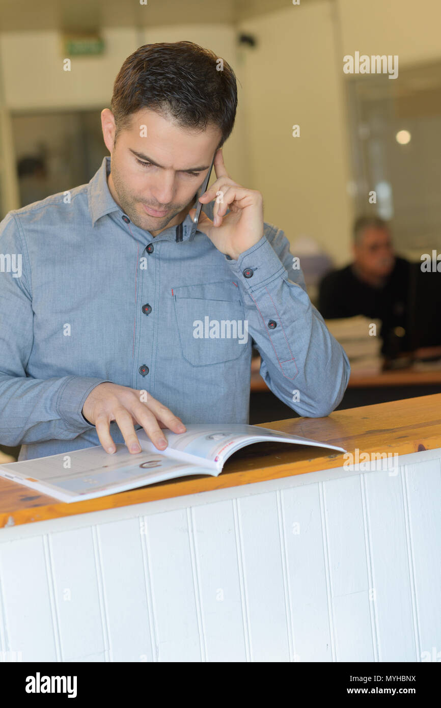 man calling for information Stock Photo - Alamy