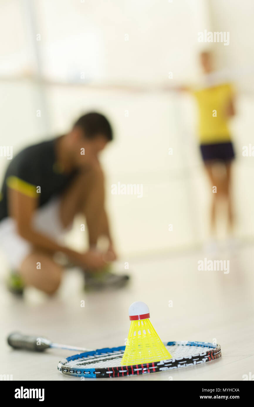 badminton courts with players competing Stock Photo - Alamy
