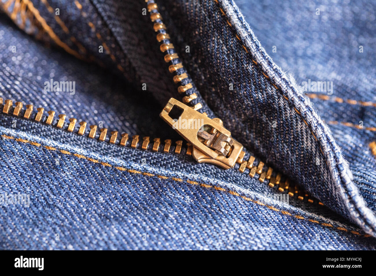 Denim jeans fabric texture background with zipper for clothing, fashion ...