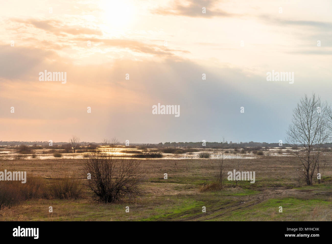 Sun shines through rain clouds hi-res stock photography and images - Alamy