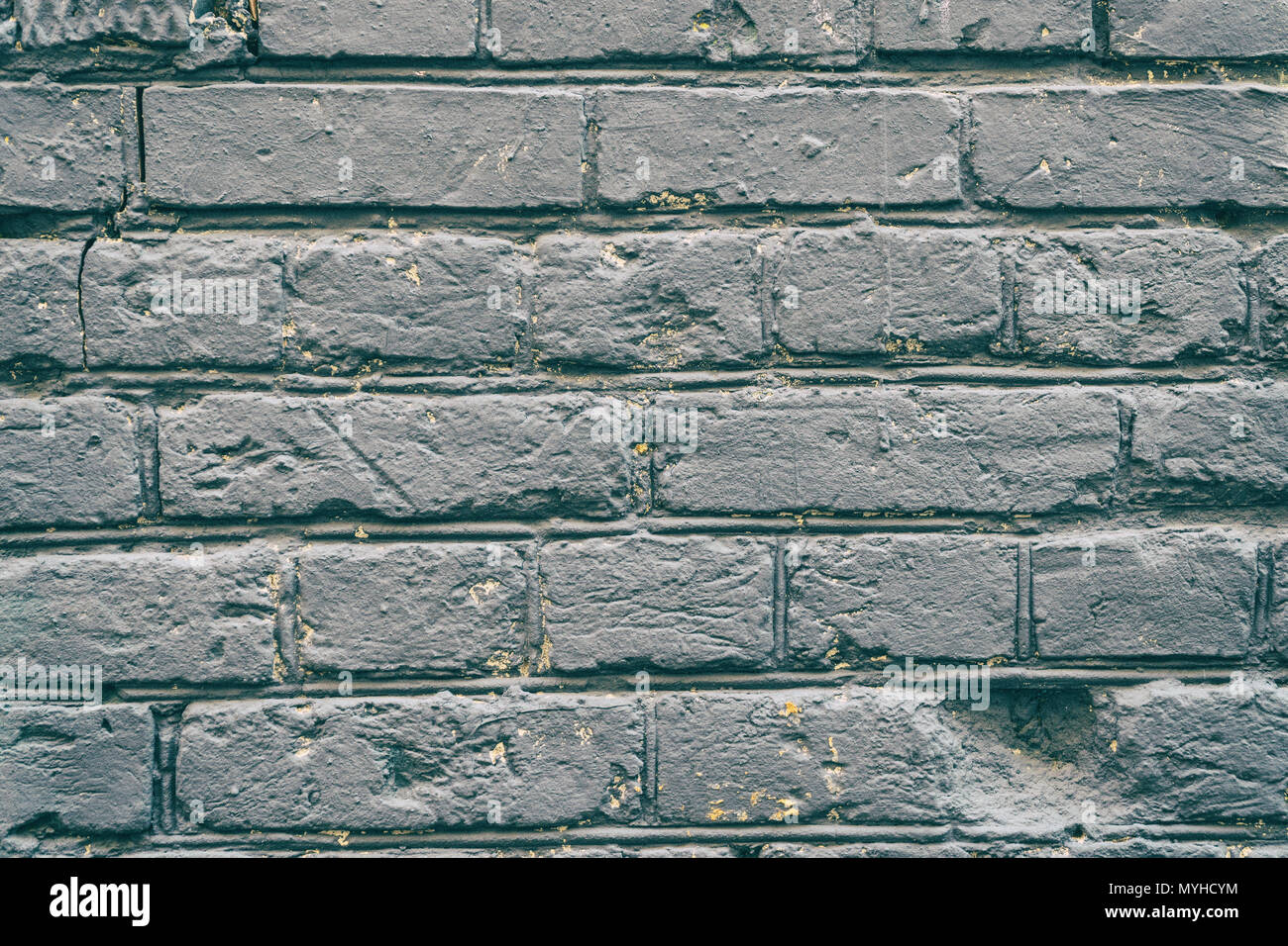 Old grey brick wall for background Stock Photo - Alamy