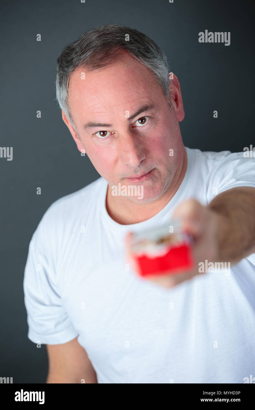 Man offering tobacco hi-res stock photography and images - Alamy