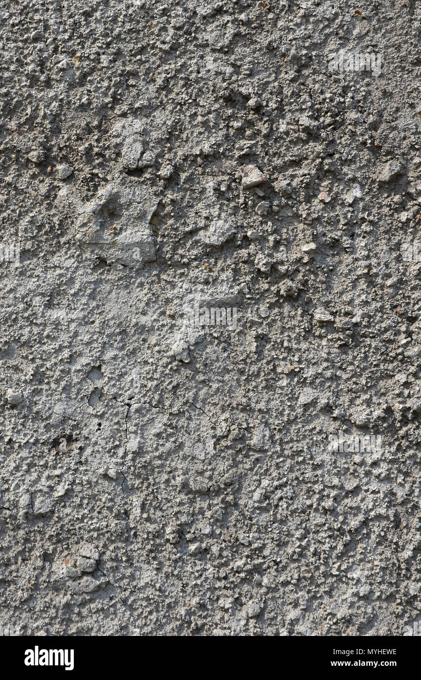 Texture of the old embossed concrete wall in gray color. Background ...