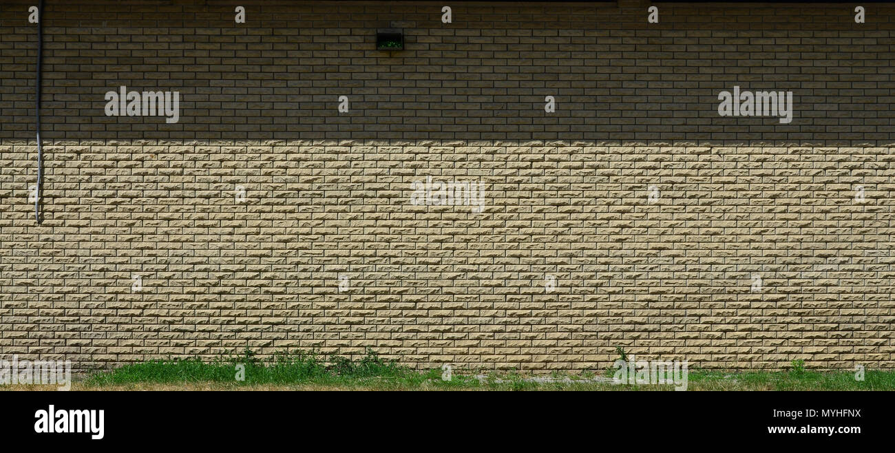 Texture of brick wall from relief stones under bright sunlight Stock ...