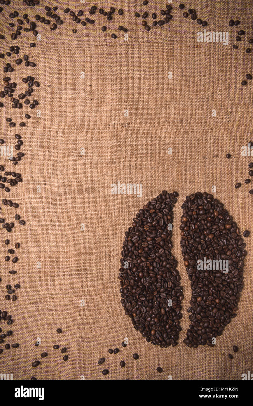 portrait toasted coffee shape beans top view on juta textile Stock ...