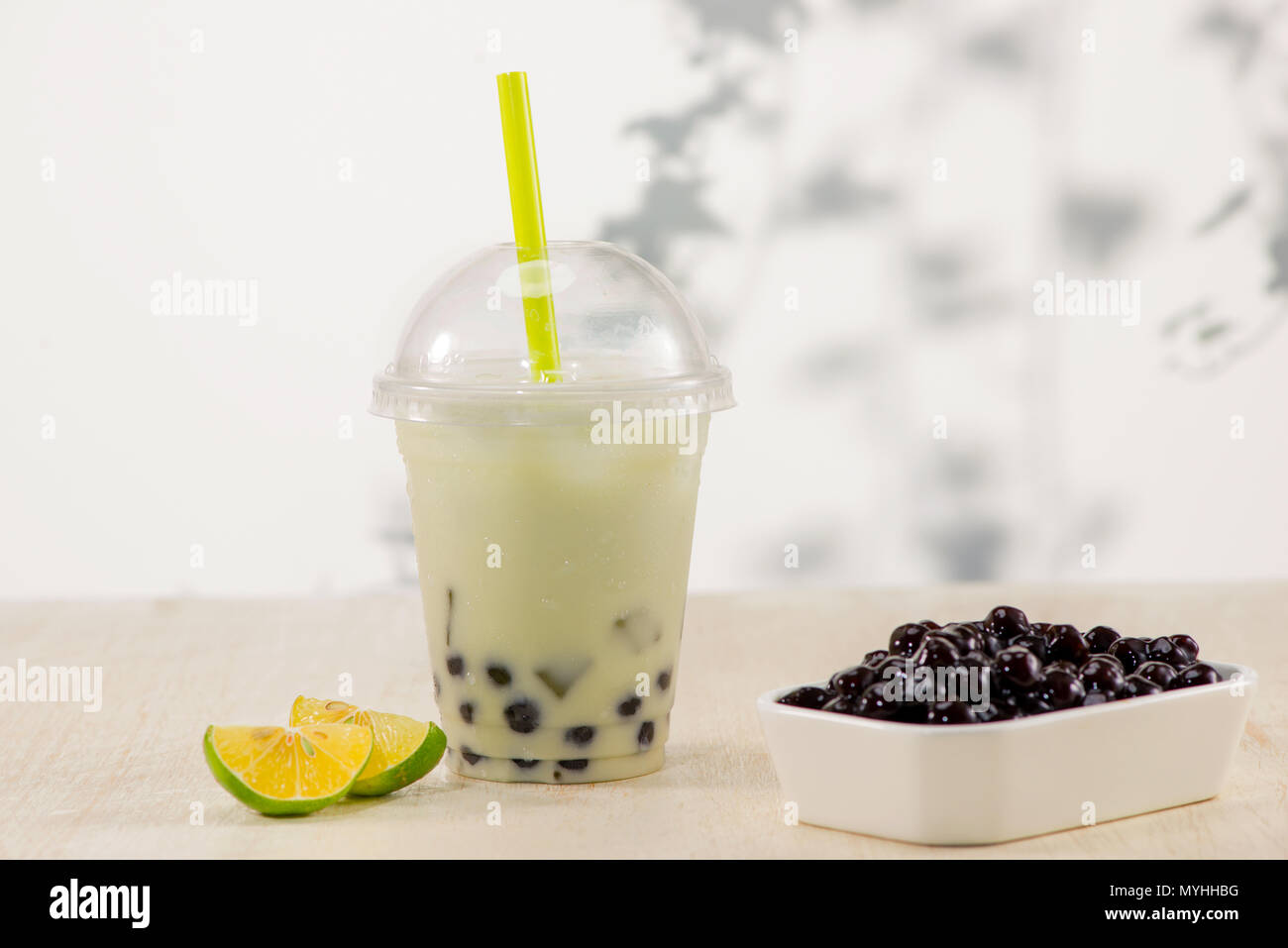 Lemon Boba Bubble Tea with fruits and crushed ice Stock Photo - Alamy