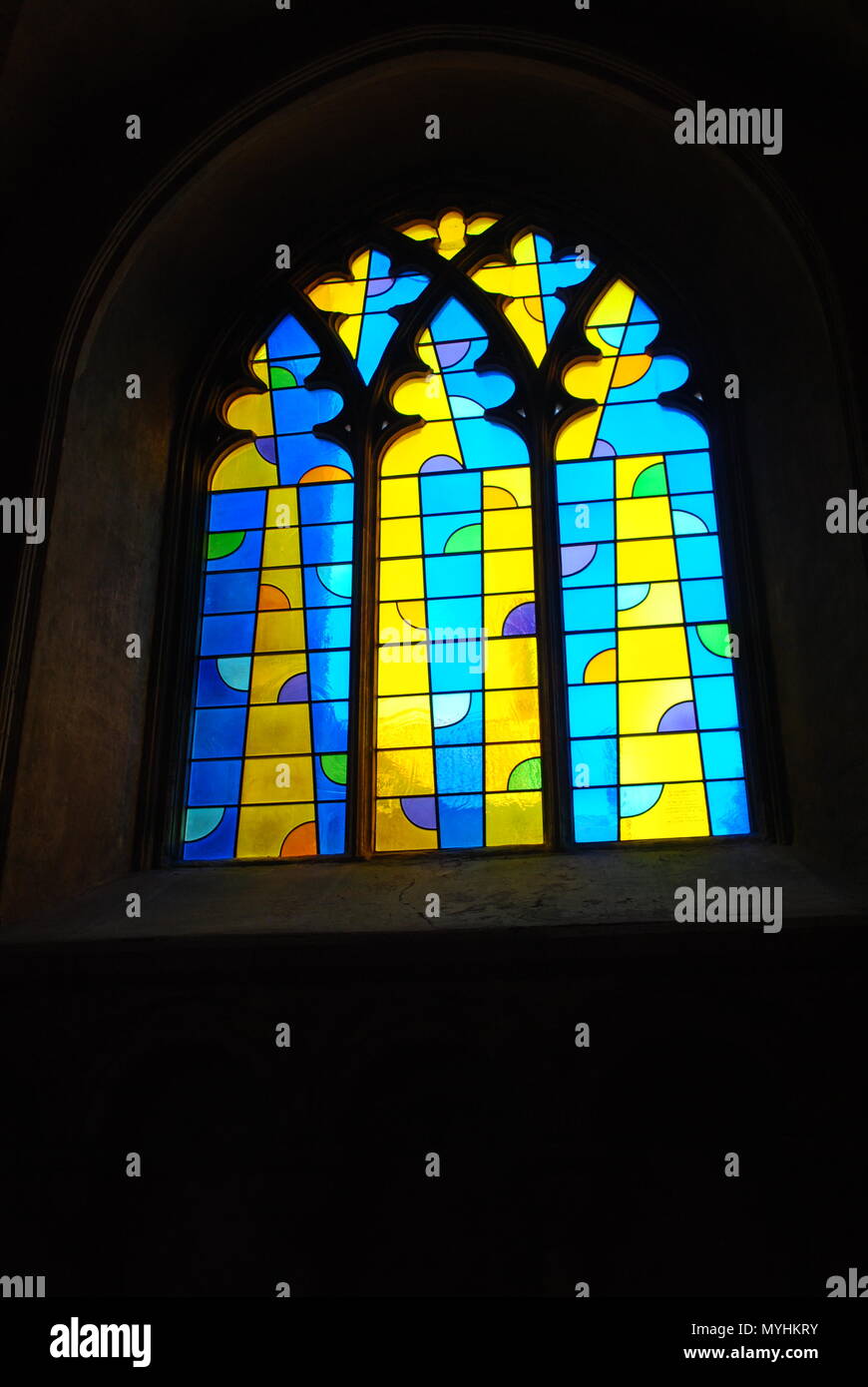 Norwich cathedral modern style staind glass window Stock Photo - Alamy