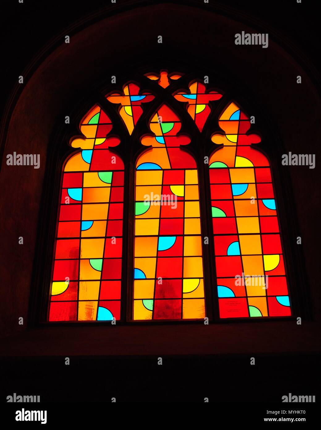 Norwich cathedral modern style staind glass window Stock Photo - Alamy