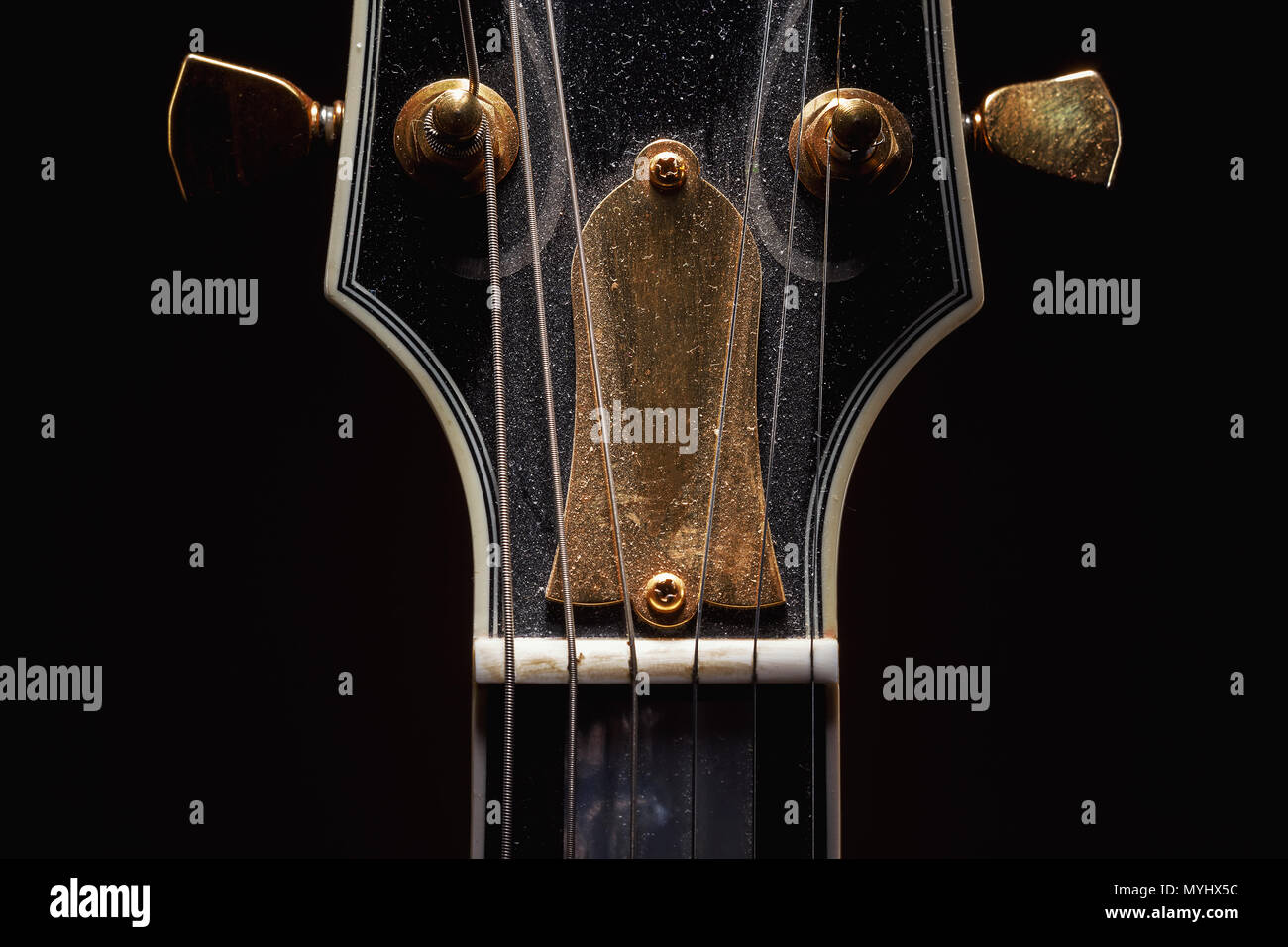 Details of an old dusty electric guitar Stock Photo - Alamy