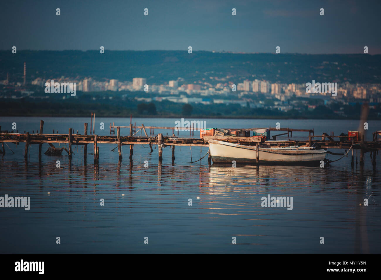 Small dock and fishing boat at fishing village Stock Photo - Alamy