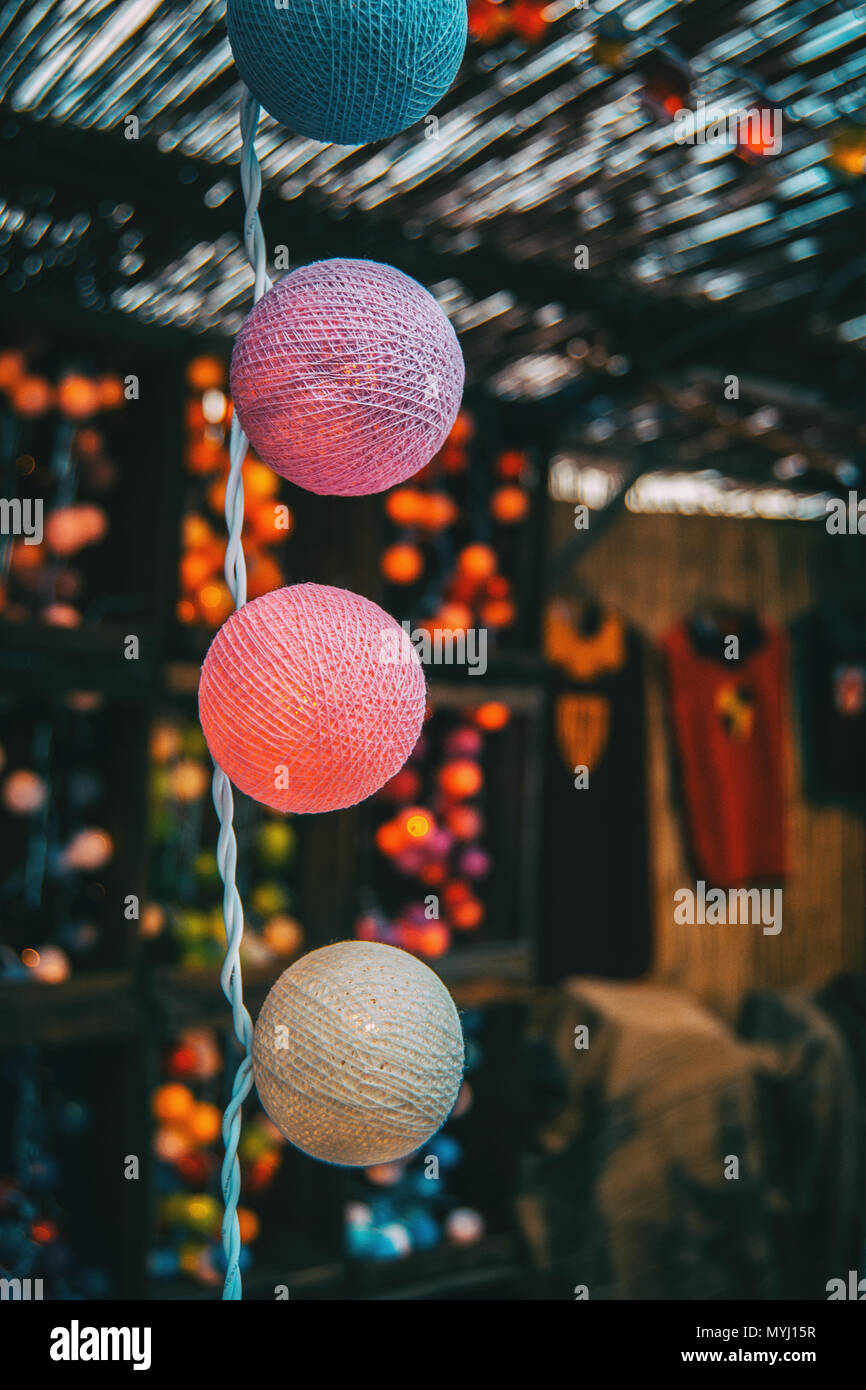 garland of colorful lights in a medieval market Stock Photo - Alamy