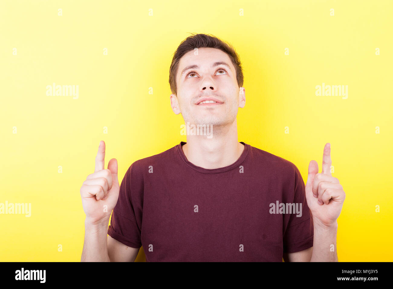 Guy pointing up hi-res stock photography and images - Alamy