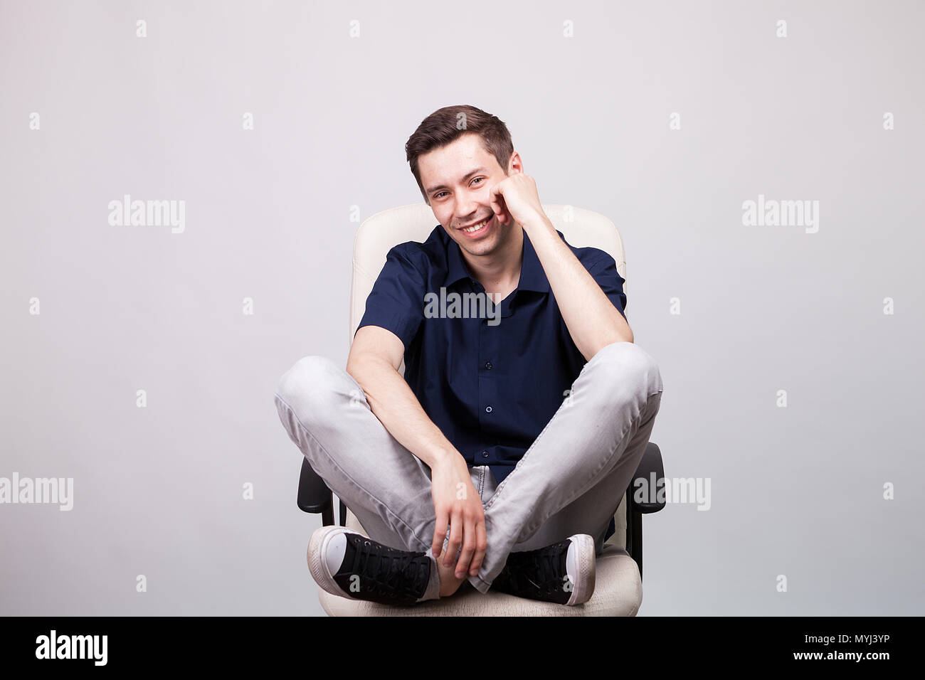 Relaxed looking man feet up hi-res stock photography and images - Alamy