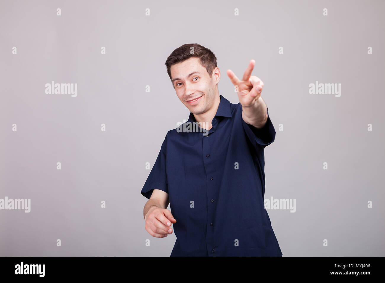 Businessman peace sign hi-res stock photography and images - Alamy