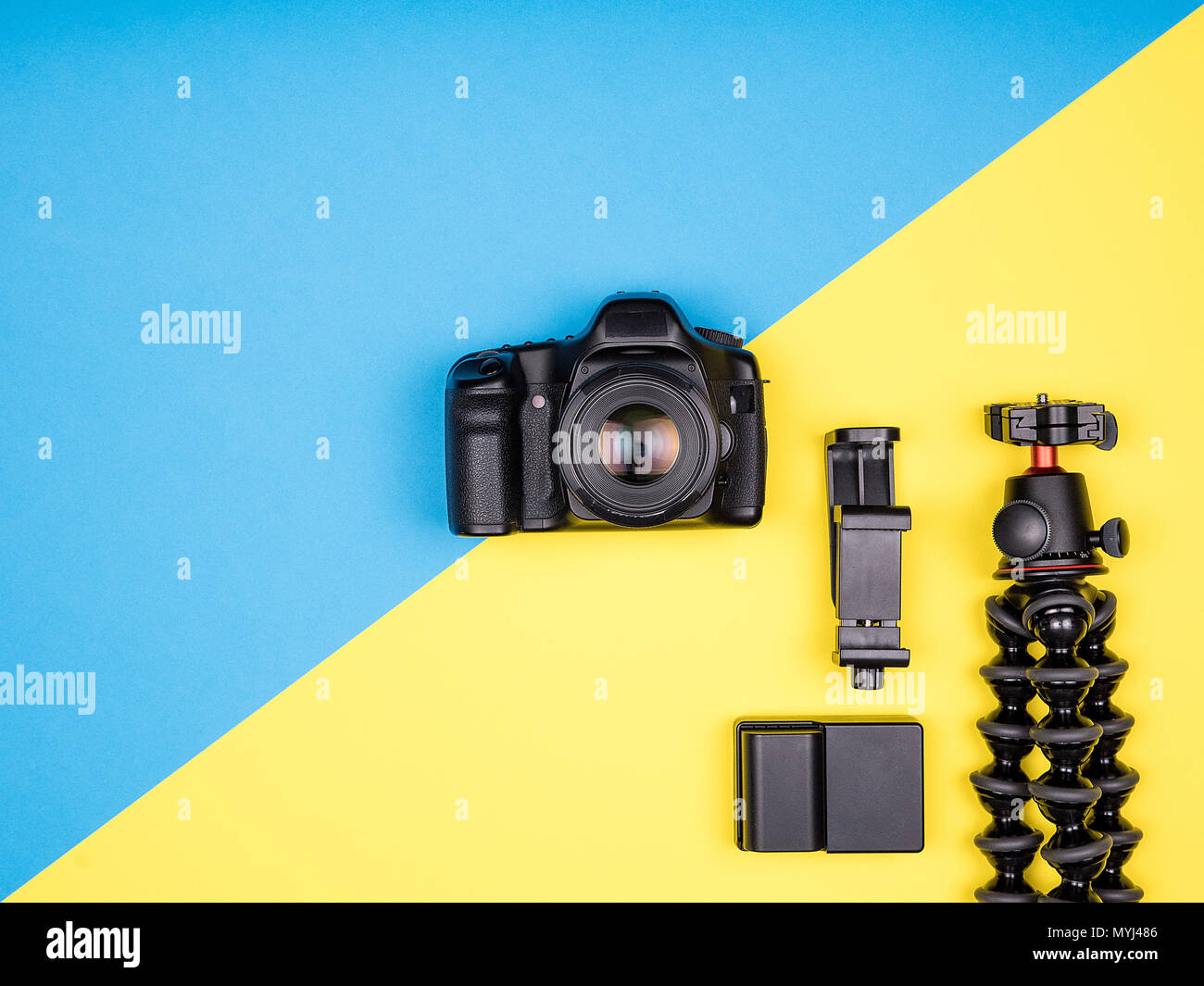 Flat lay top view of camera with accessories Stock Photo - Alamy