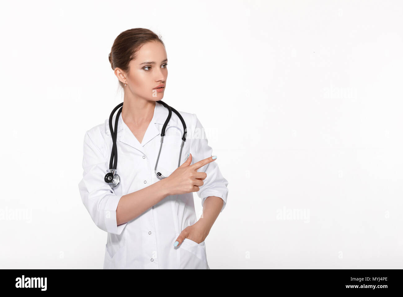 Doctor stethoscope showing something hi-res stock photography and ...