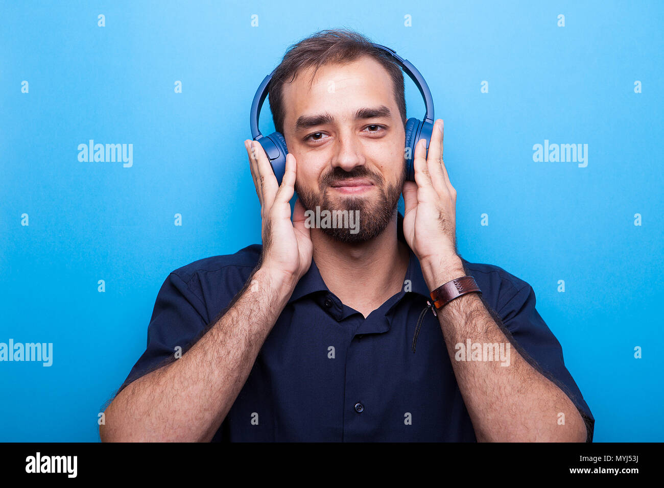 Man listening through headset computer hi-res stock photography and ...