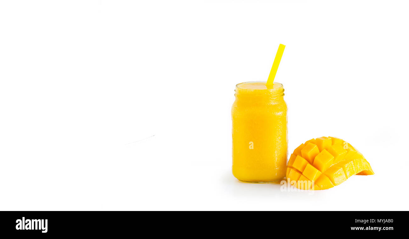 Yellow Mango juice In a glass And mango isolated background Stock Photo ...