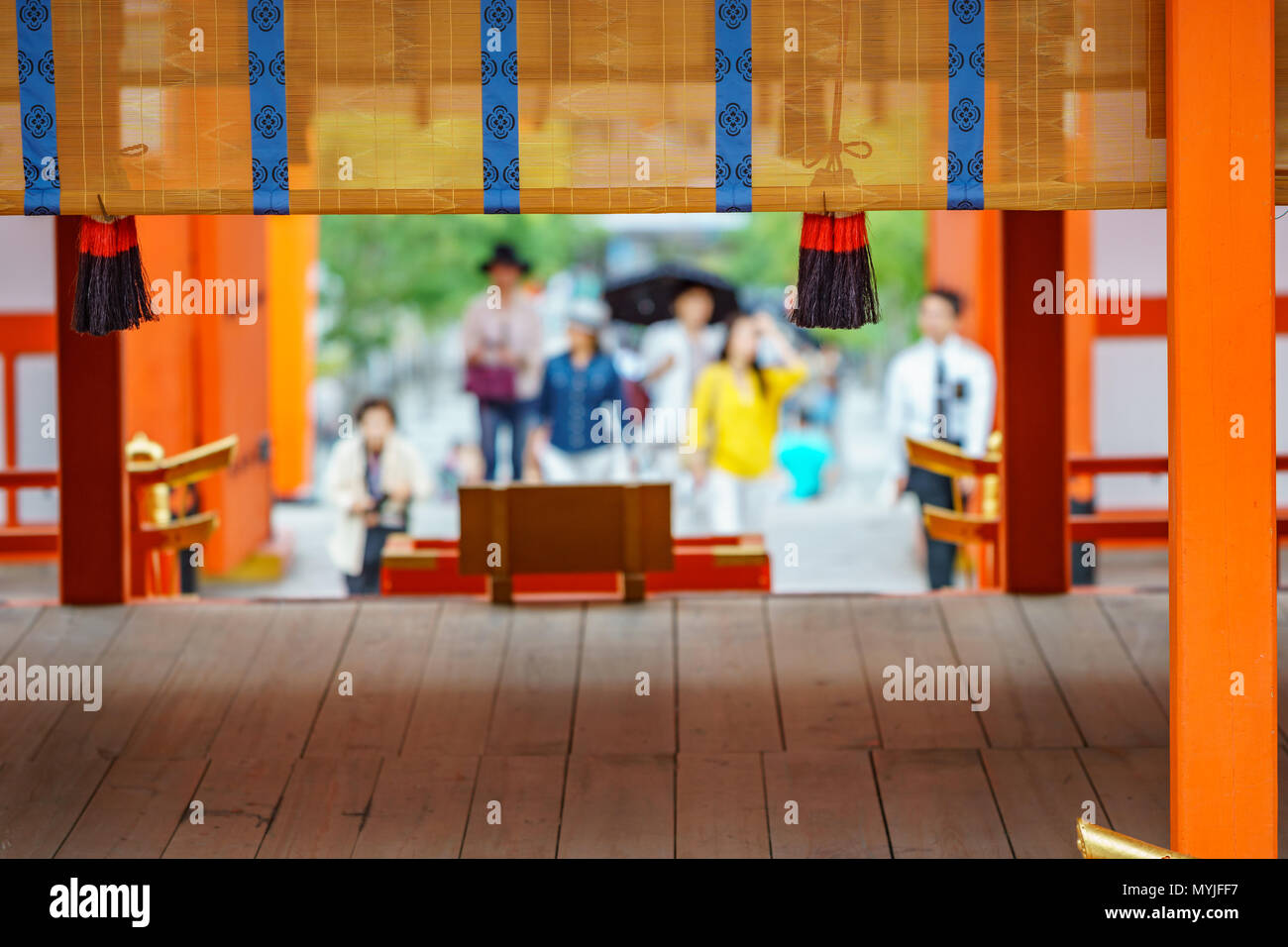 Blurred believers praying in japanese temple Stock Photo - Alamy