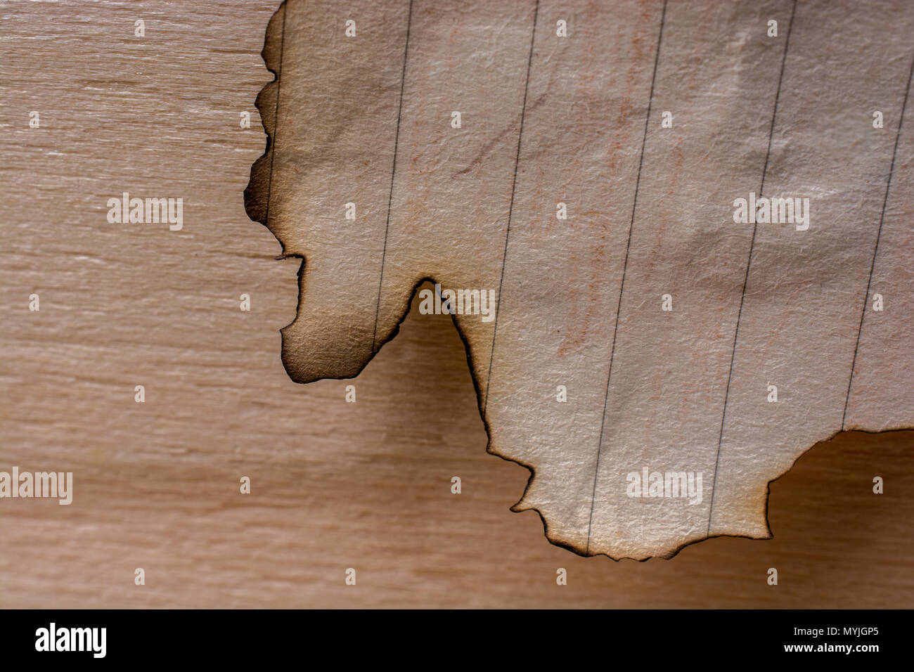 Paper with some burned edges Stock Photo - Alamy