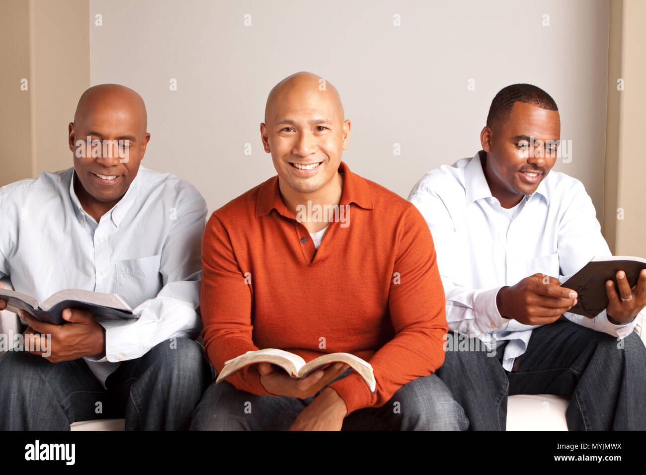Diverse group of men studying together. Small group Stock Photo - Alamy