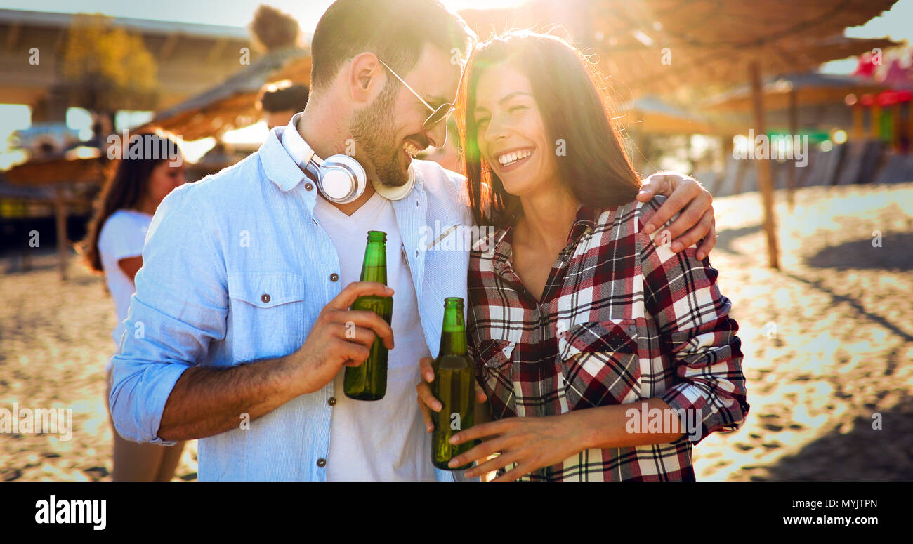 Happy friends laughing and smiling outdoors Stock Photo - Alamy