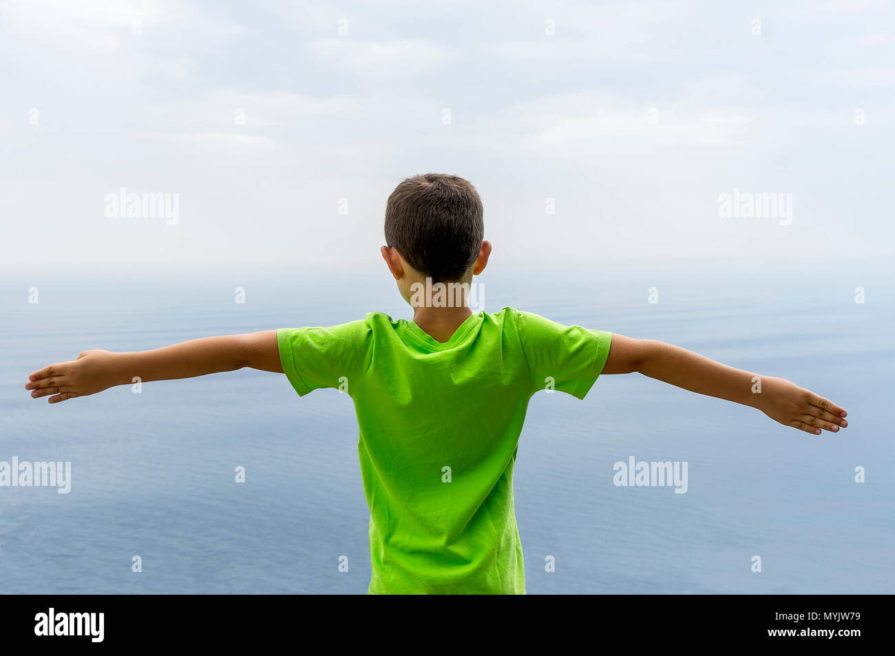 Boy open arms hi-res stock photography and images - Alamy