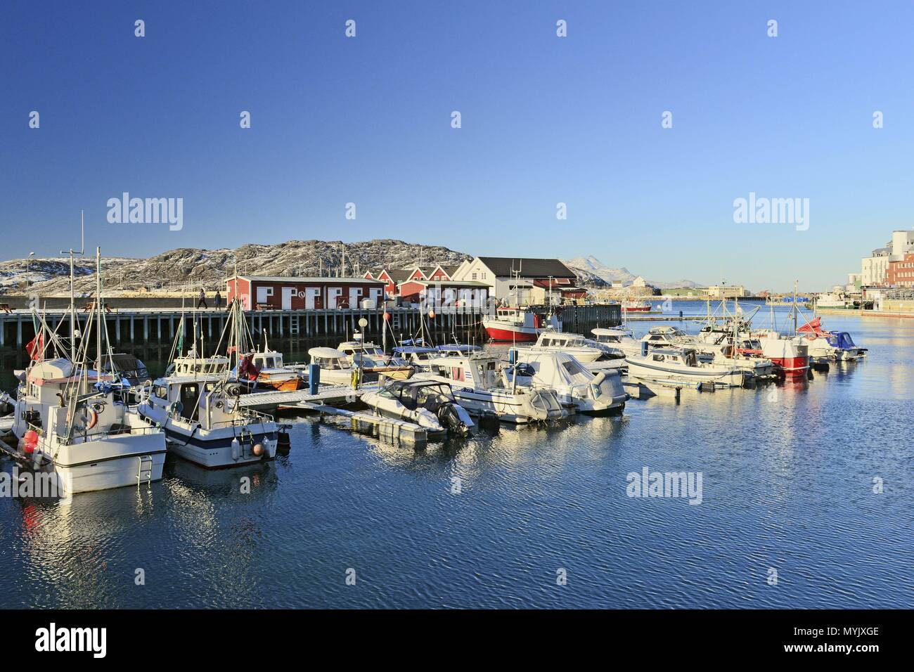 Bodø's harbour basin with boat bridges and recreational crafts and the ...
