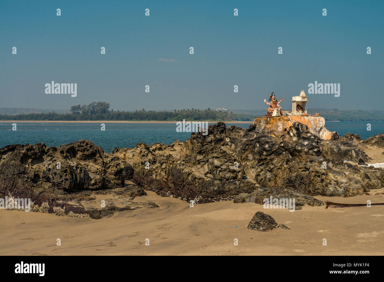 Statue of the Hindu God Vishnu near Siddeshwar Temple on Chapora beach ...
