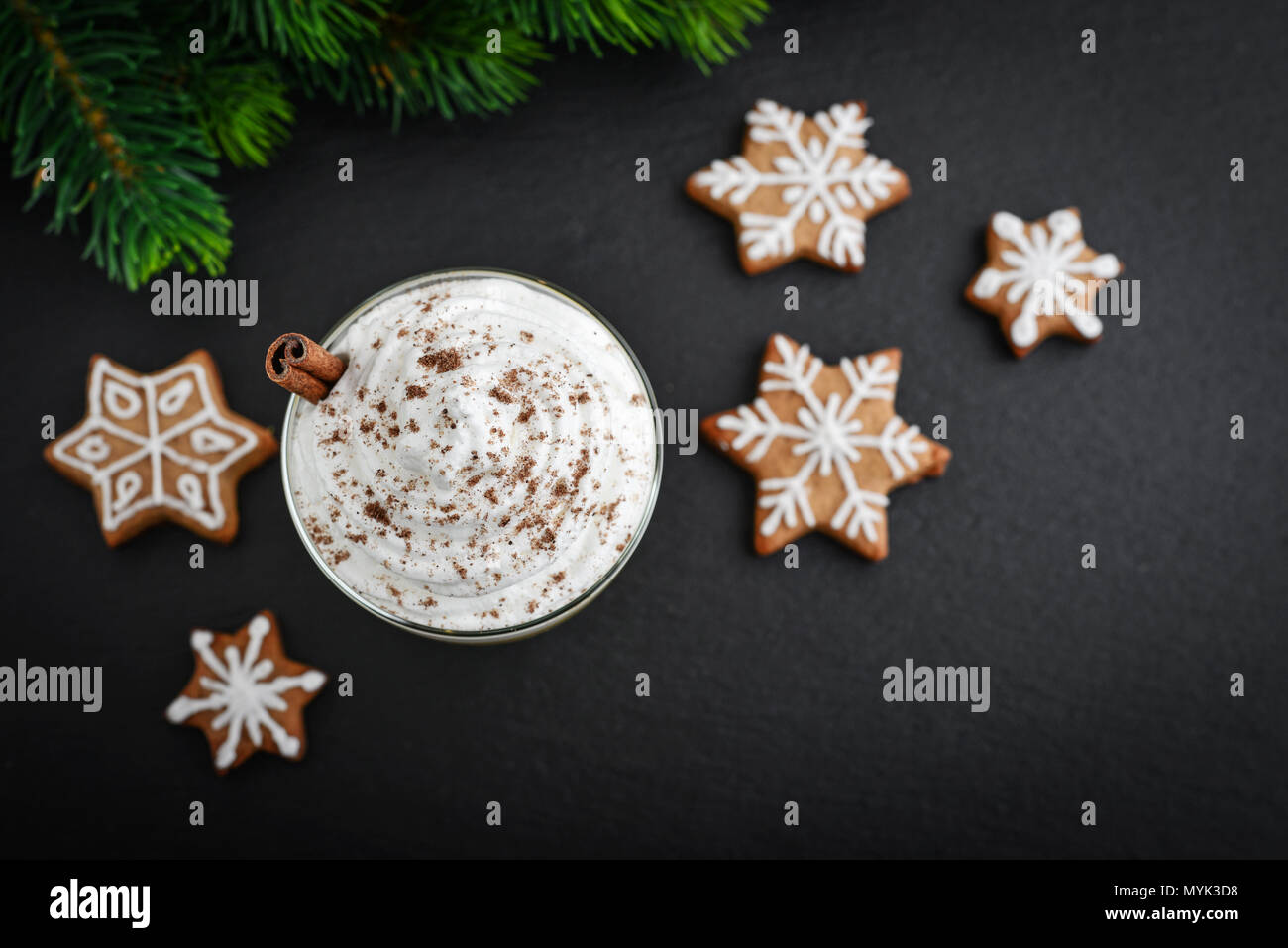 Christmas drink eggnog in glass with cinnamon and fir tree twig on ...