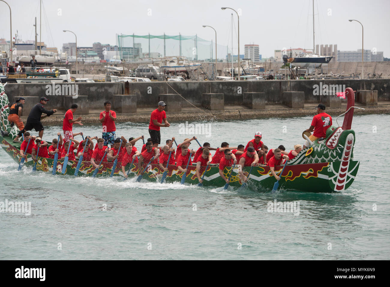 The Single Marine Program’s dragon boat team takes off at the sound of ...