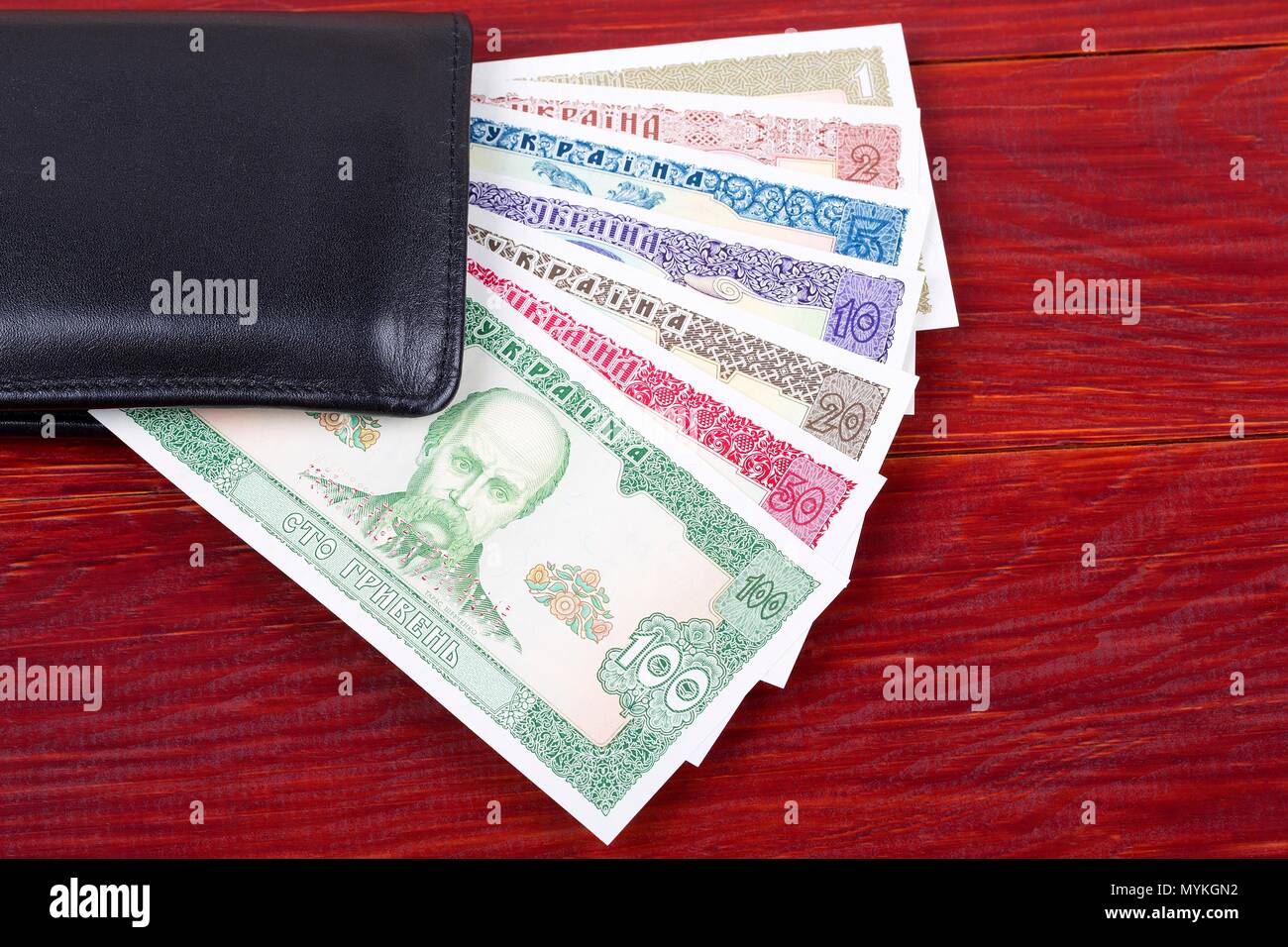 Old Ukrainian money in the black wallet Stock Photo - Alamy